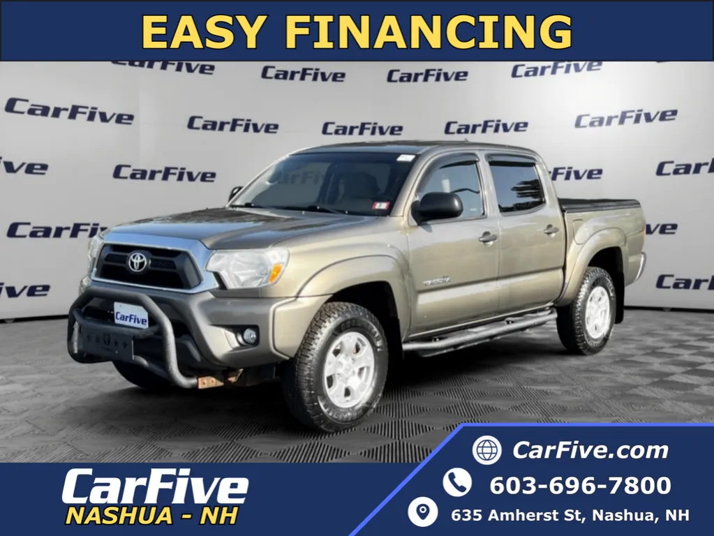 Used 2015 Toyota Tacoma for sale in Nashua, NH at CarFive | VIN: 3TMLU4ENXFM182132